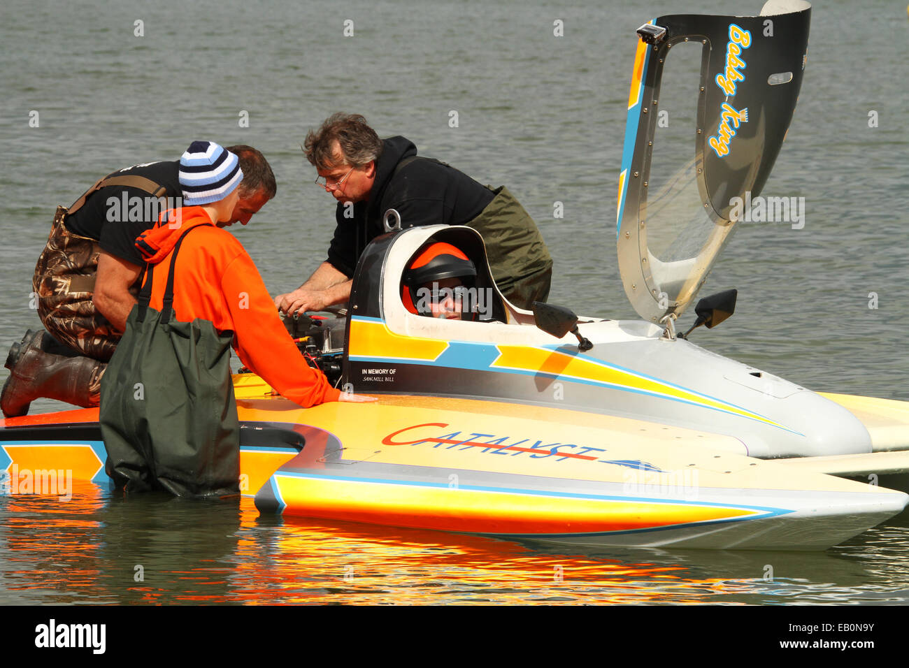 Making engine adjustments on hydroplane hi-res stock photography and ...
