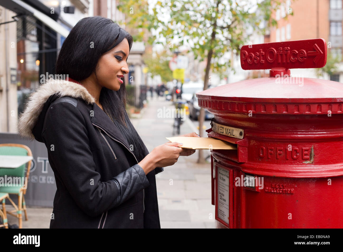 Person Mailing A Letter