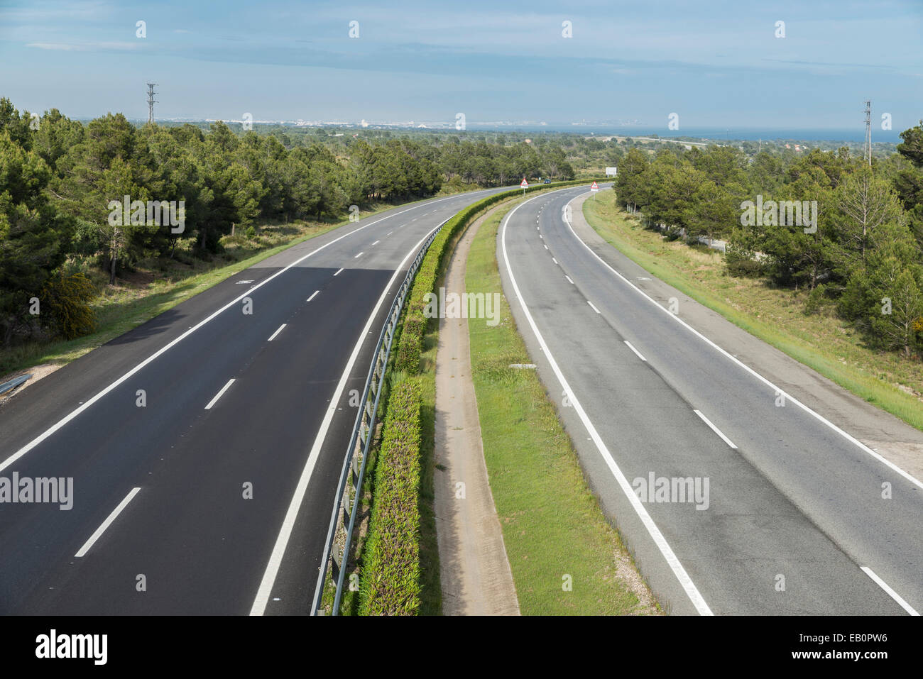 empty highway snakes off into the distance Stock Photo - Alamy