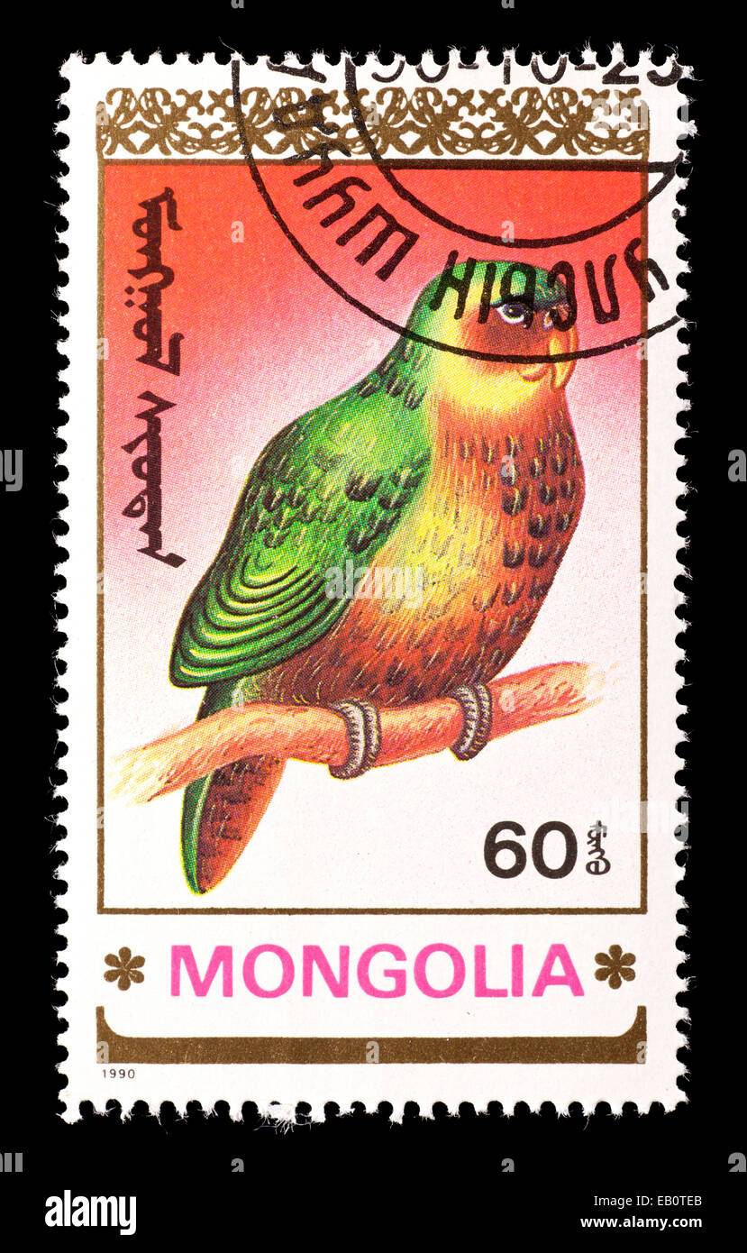 Postage stamp from Mongolia depicting a parrot Stock Photo - Alamy