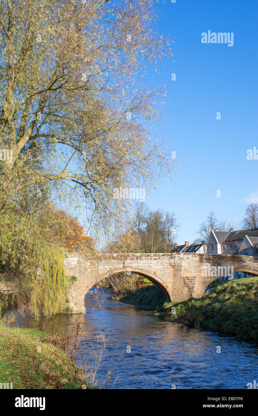An autumn view of the 16th century Canongate Bridge over Jed Water ...