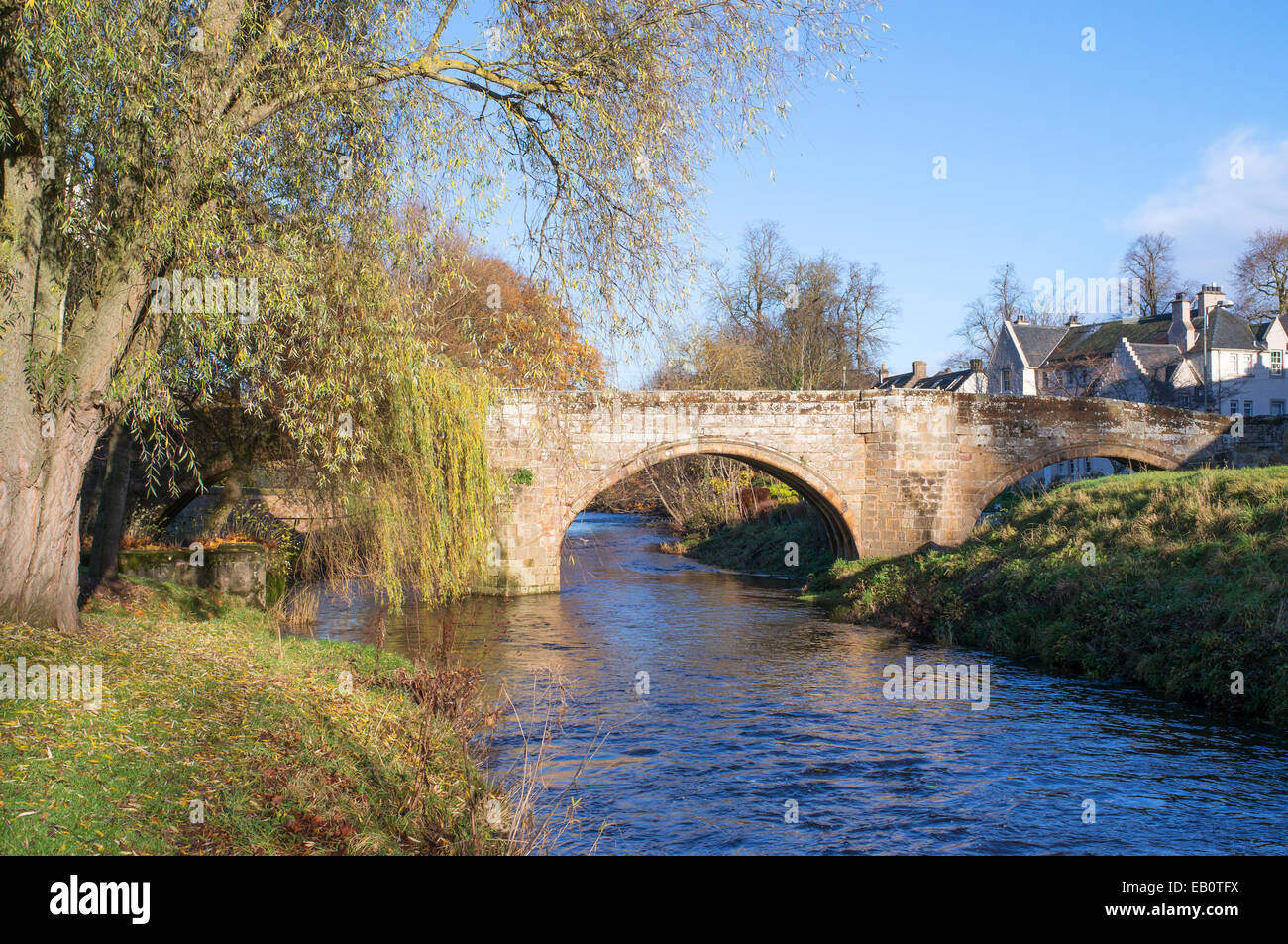 An autumn view of the 16th century Canongate Bridge over Jed Water ...