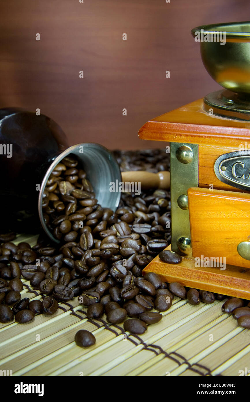 coffee beans, pot and grinder on sacking Stock Photo - Alamy
