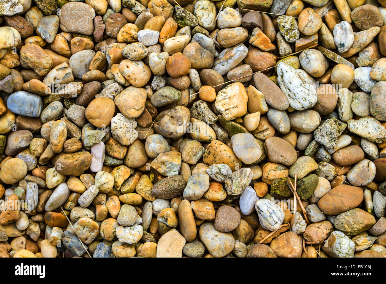 Rocks in different colors and shapes, background Stock Photo - Alamy