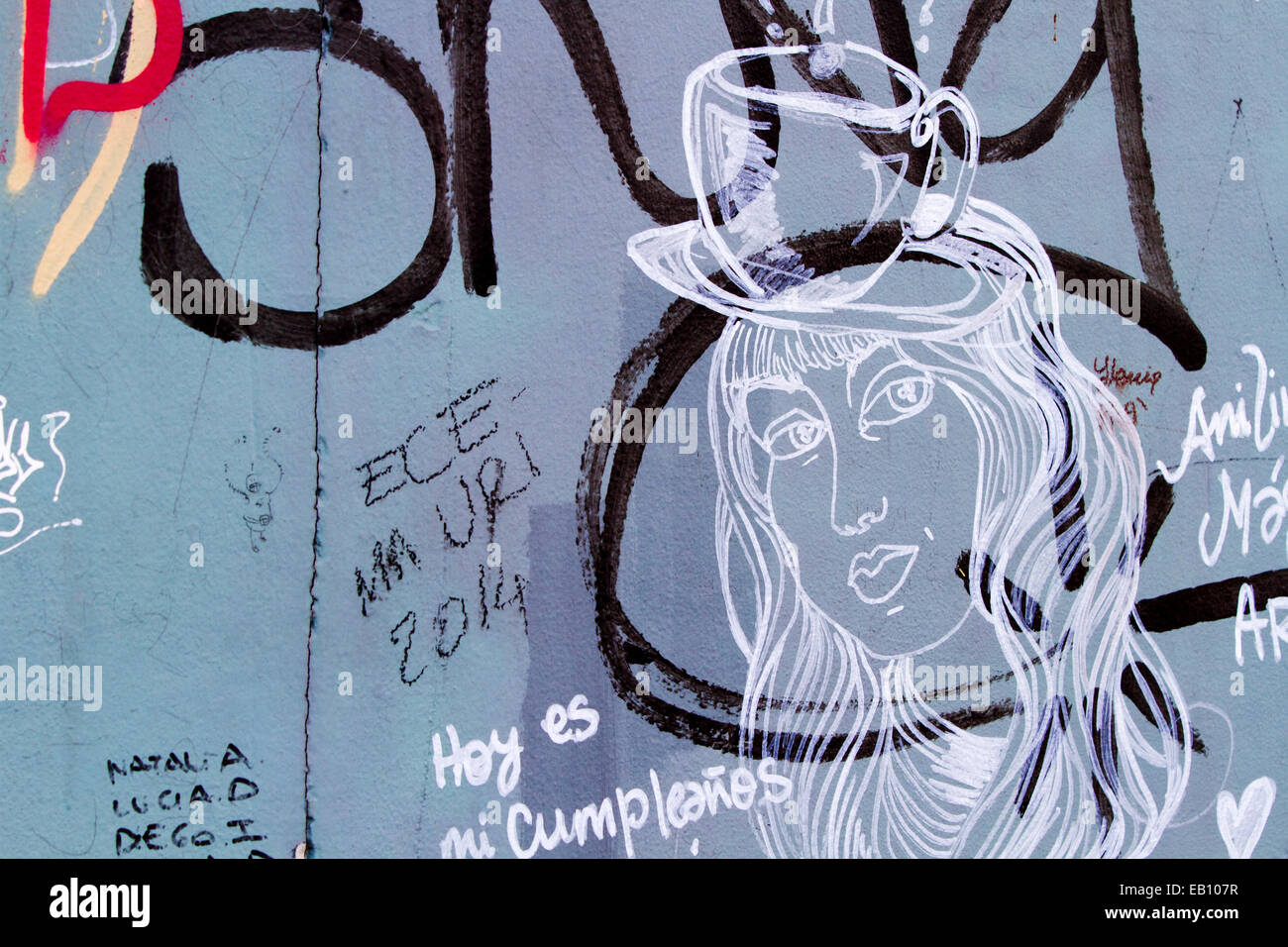 Graffiti women painting tags street art Berlin wall Stock Photo - Alamy
