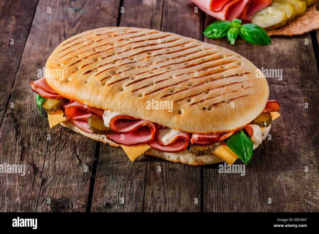 Grilled panini with ham and cheese Stock Photo - Alamy