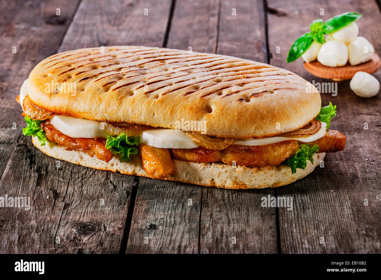 Grilled panini with grilled chicken and mozzarella Stock Photo - Alamy