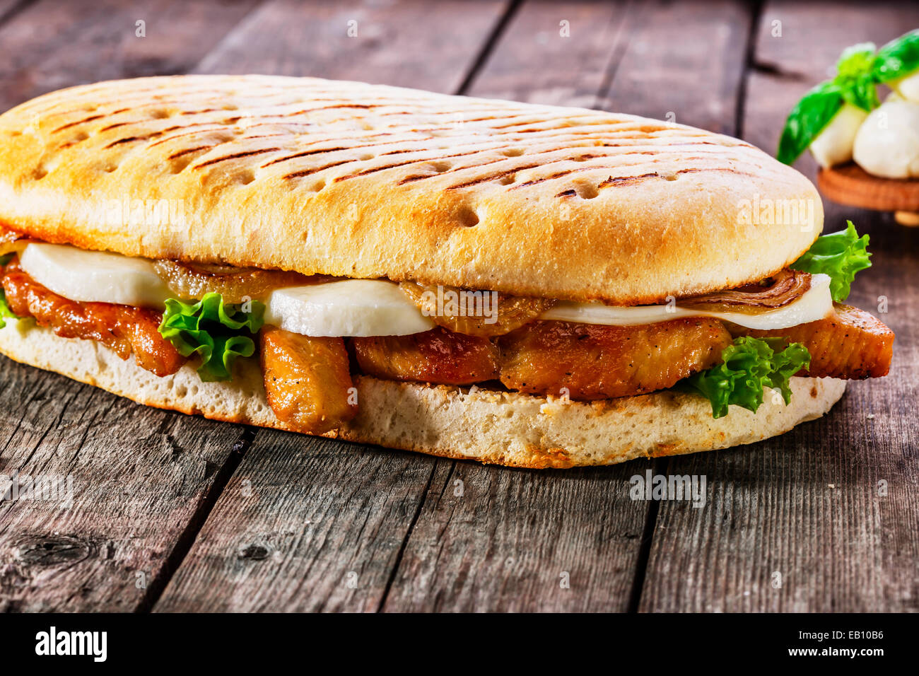 Grilled panini with grilled chicken and mozzarella Stock Photo - Alamy