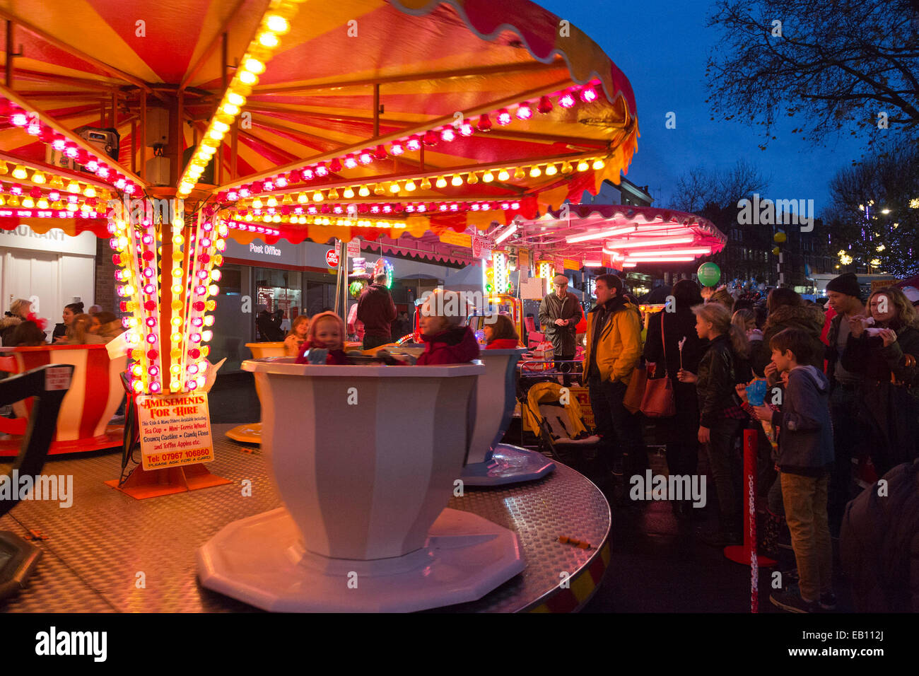 Christmas festival with carousels in Hampstead High Street, London, UK ...