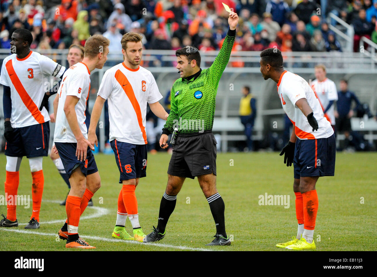 Syracuse, New York, USA. 23rd Nov, 2014. Referee Mark Allatin issues ...