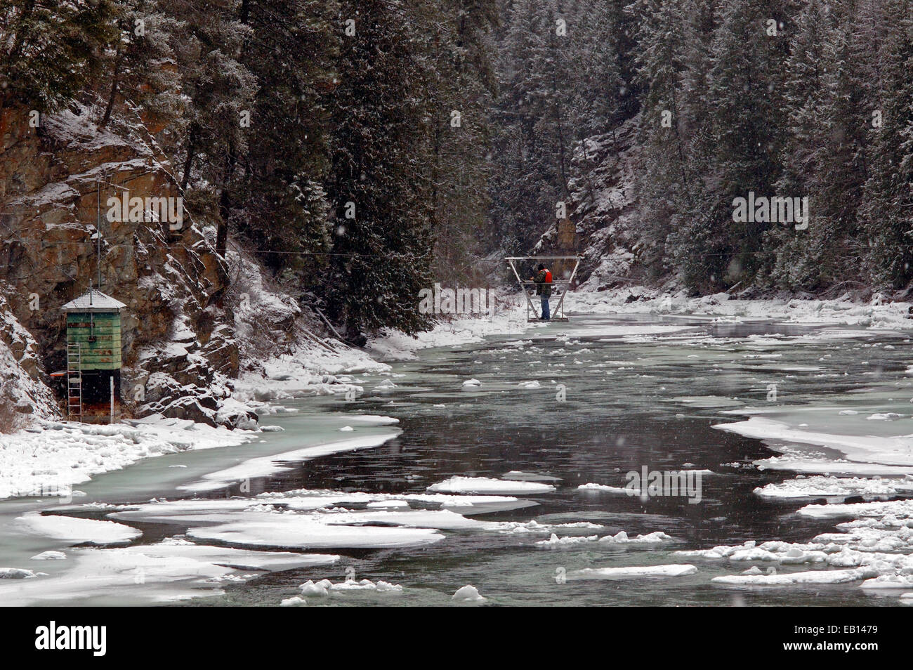 Checking a USGS stream gage on the Yaak River in winter. Kootenai River ...