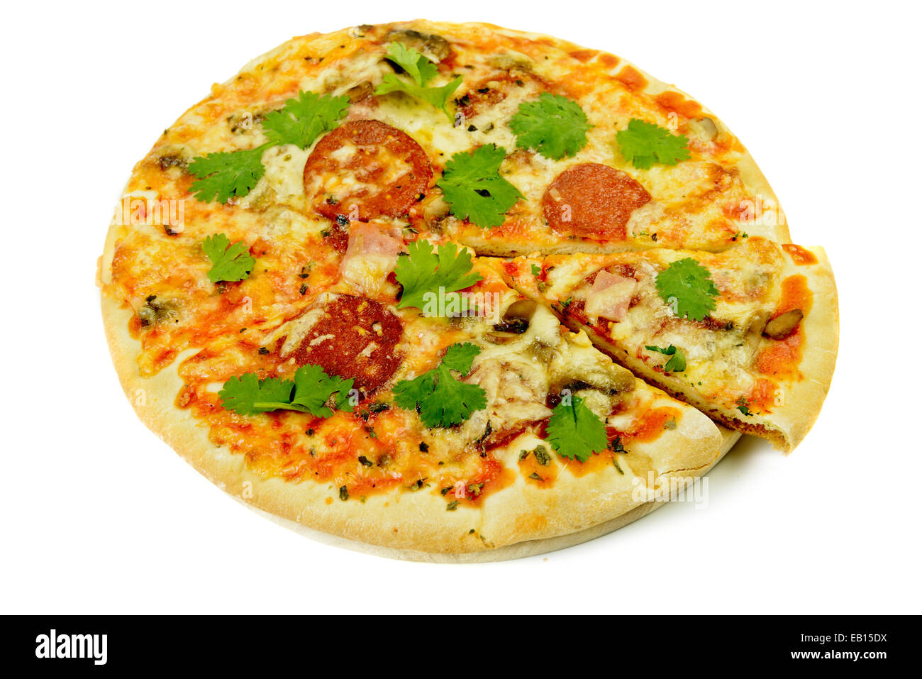 Mini thinly sliced pepperoni pizza with herbs isolated on white Stock ...