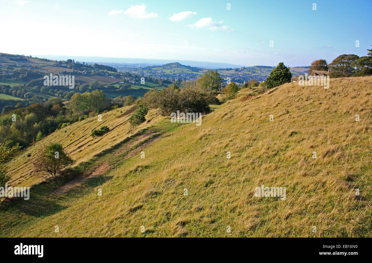 A view looking out at the meadows and valleys of the Cotswolds viewed ...