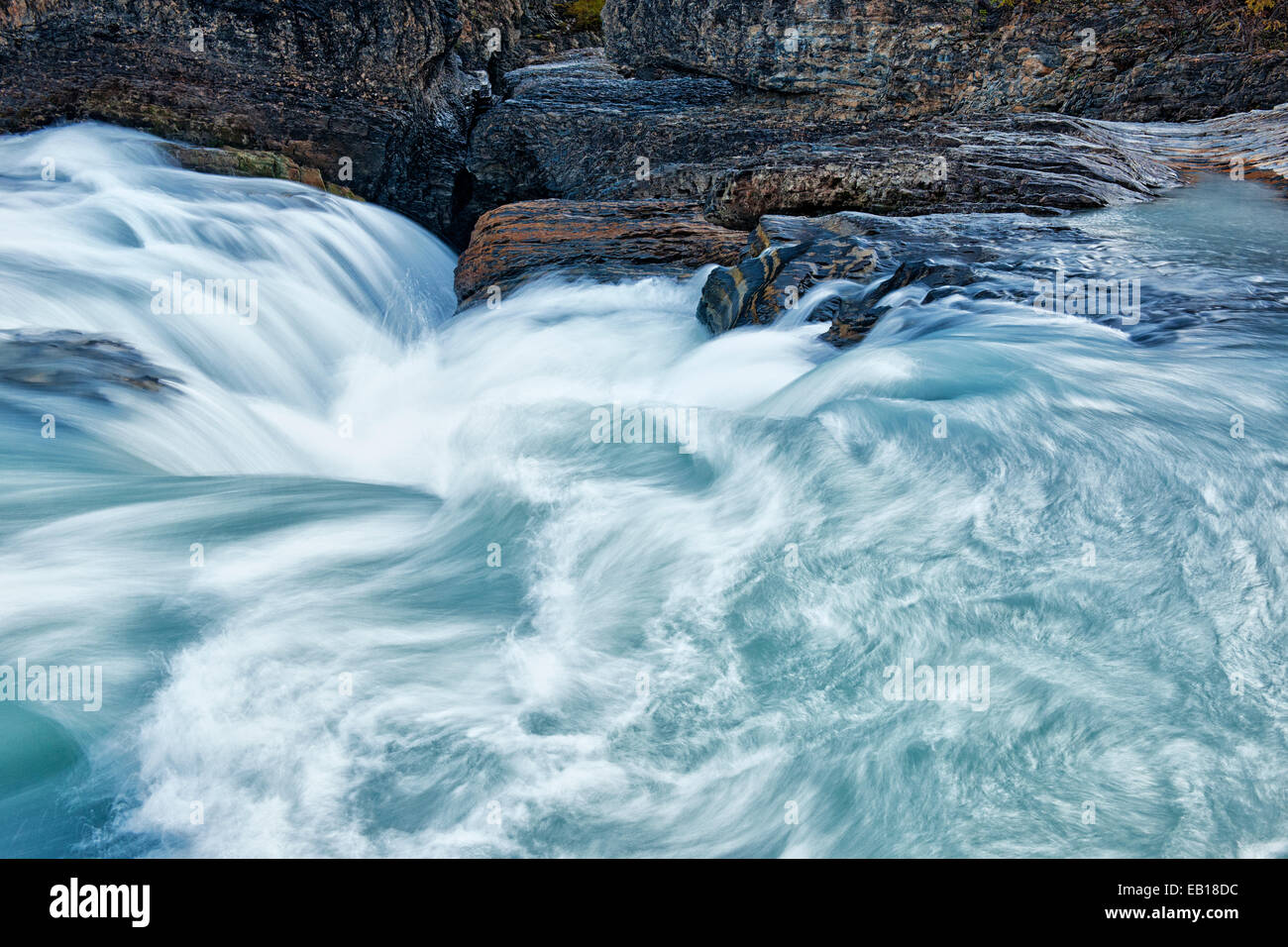 Glacier fed Kicking Horse River at Natural Bridge Falls in British ...