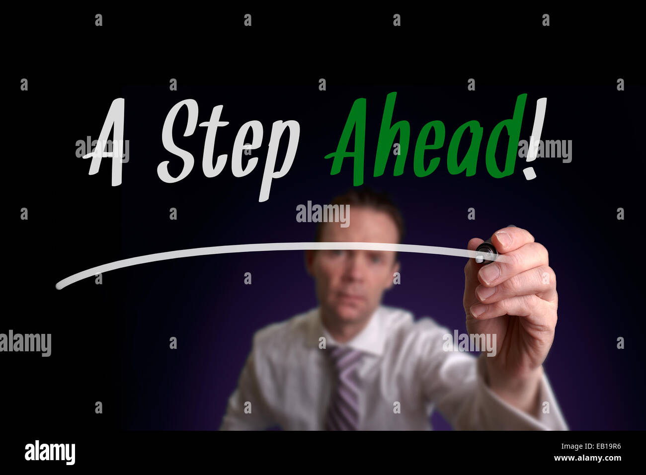 A businessman writing a Step Ahead on a screen. Business Concept Stock ...