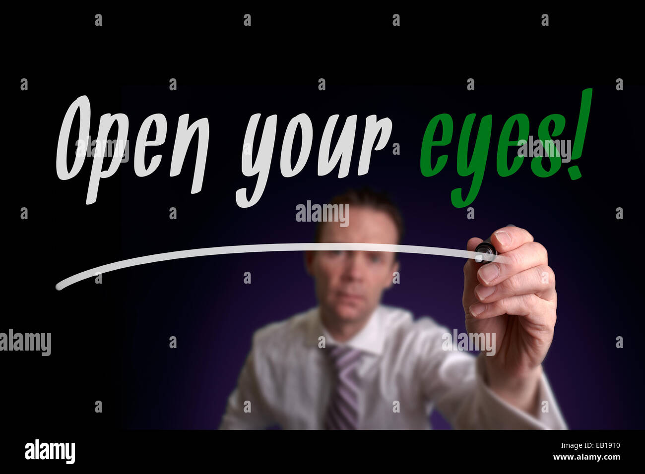 A businessman writing Open Your Eyes on a screen. Business Concept ...