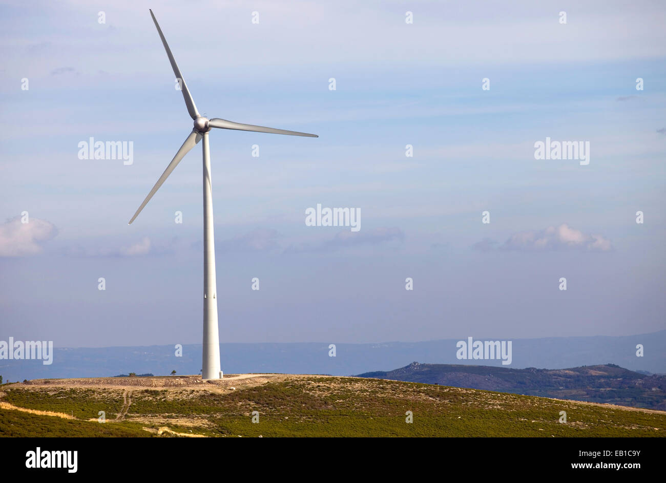 white wind turbine in the top of the mountain Stock Photo - Alamy