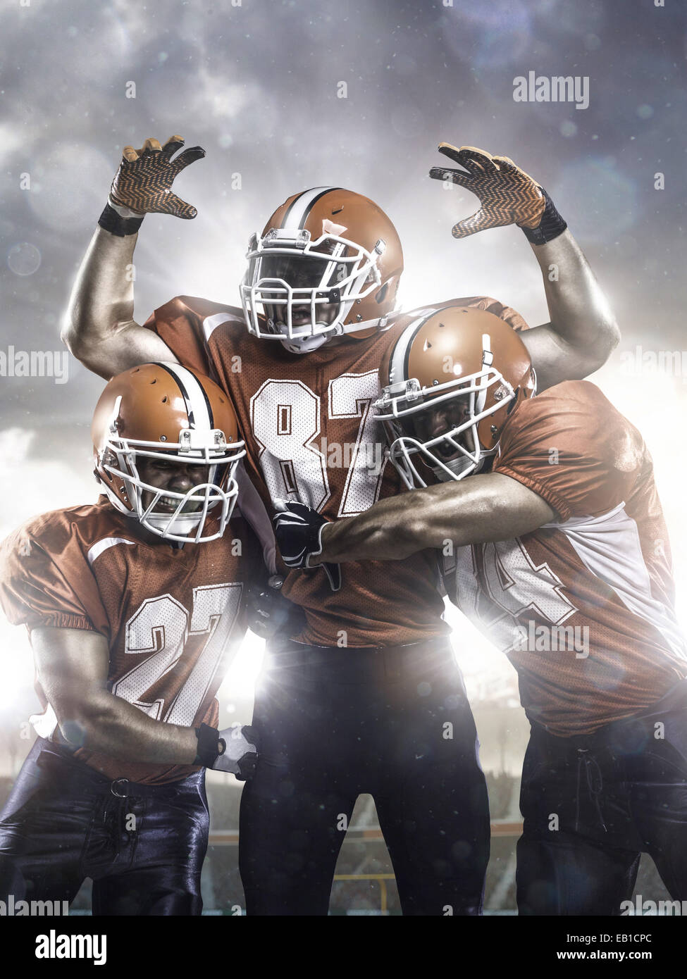 American football players in action on the stadium Stock Photo - Alamy