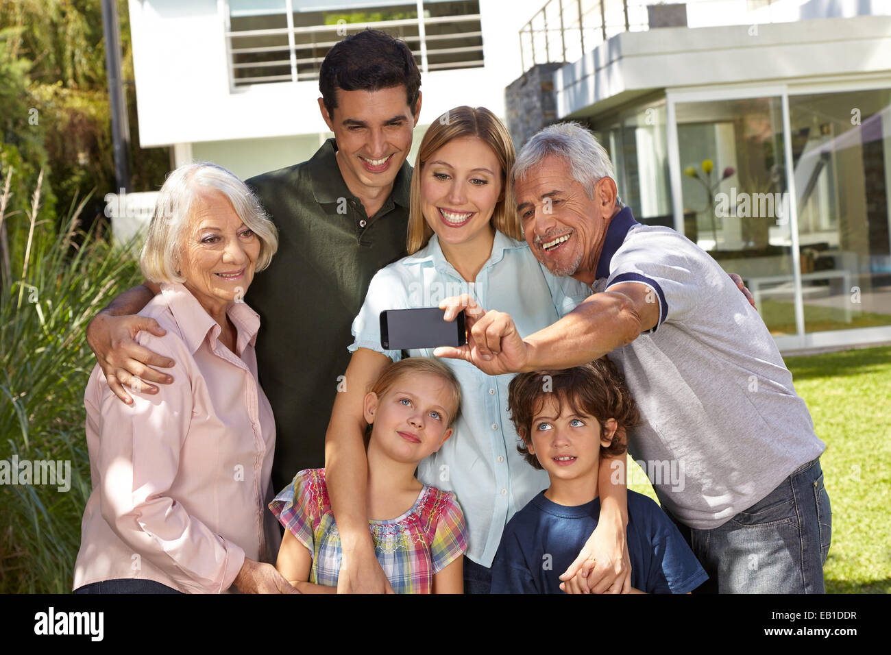 Three generations together photo hi-res stock photography and images ...