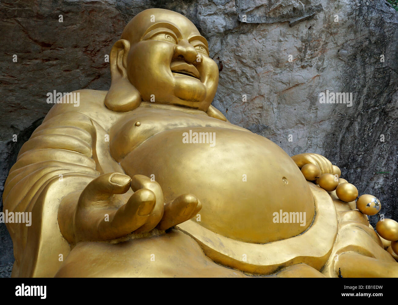 Statue of happy Buddha Stock Photo - Alamy