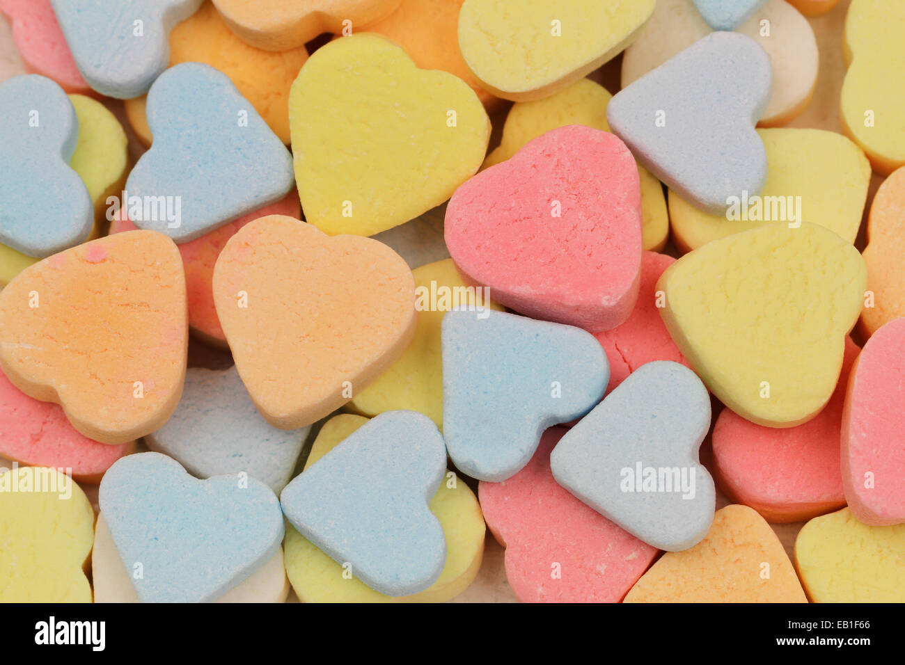 Orange candy hearts hi-res stock photography and images - Alamy