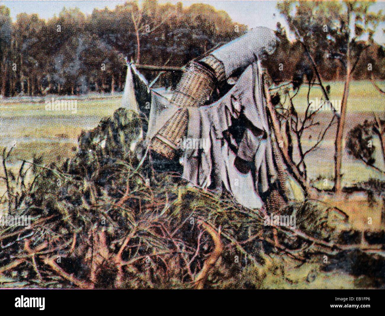 The contemporary colorized German propaganda photo shows a dummy canon ...