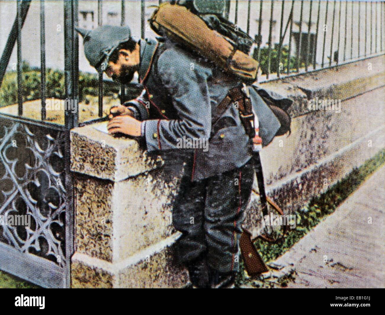 A contemporary German colorized propaganda photo shows a German soldier ...