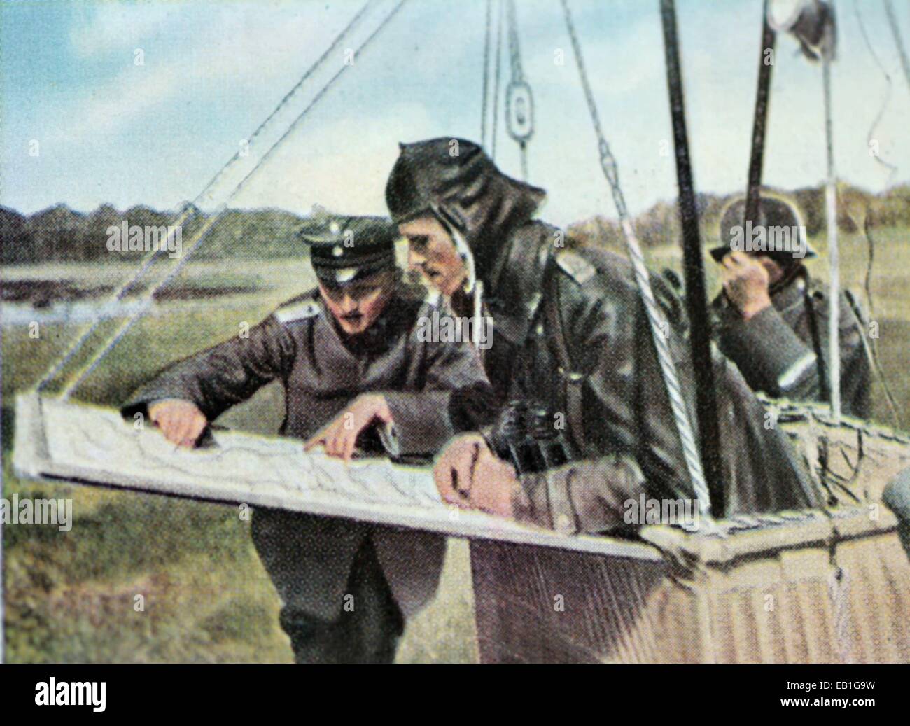 The contemporary colorized German propaganda photo shows an field ...