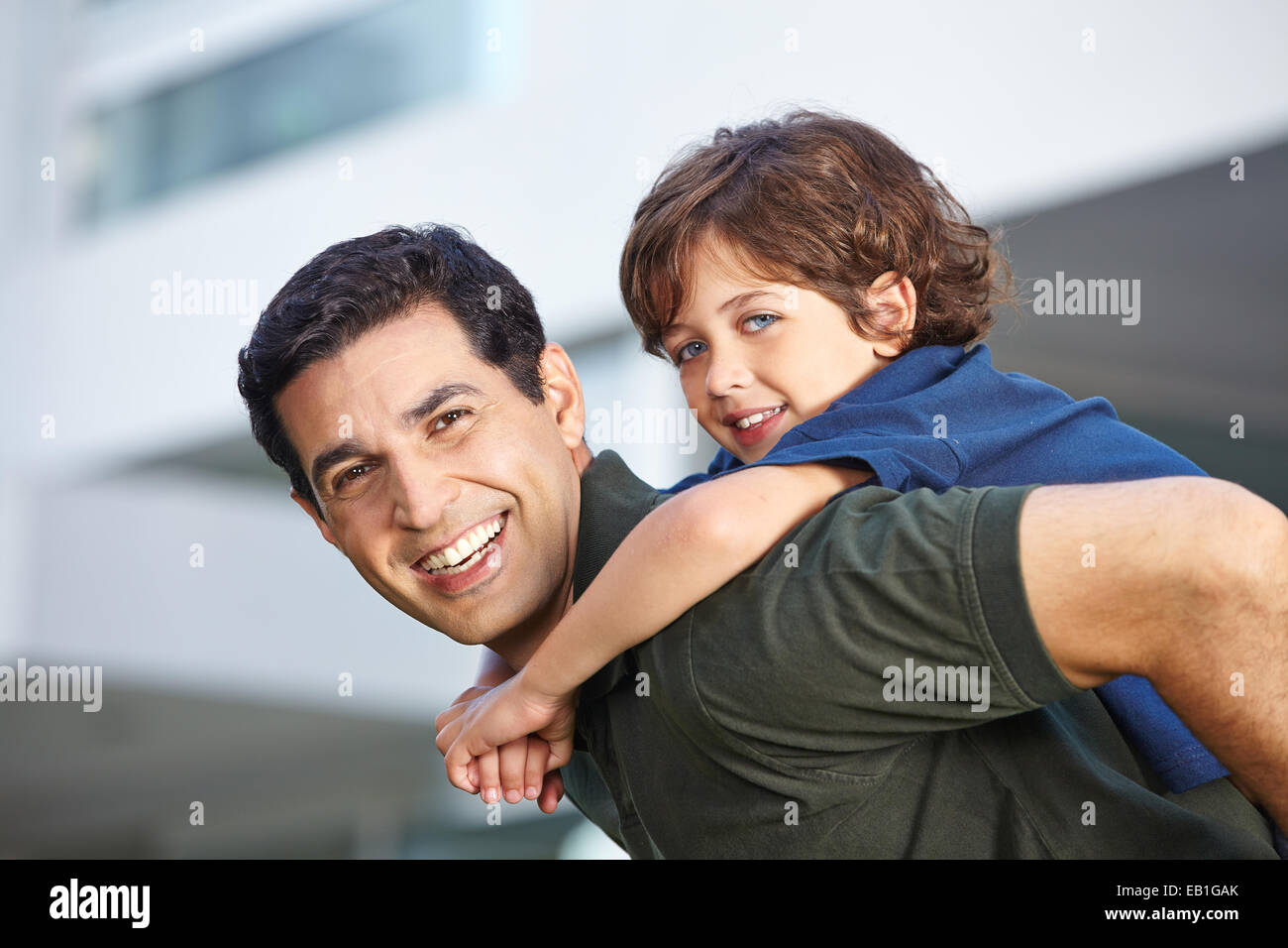 Carry piggyback hi-res stock photography and images - Alamy