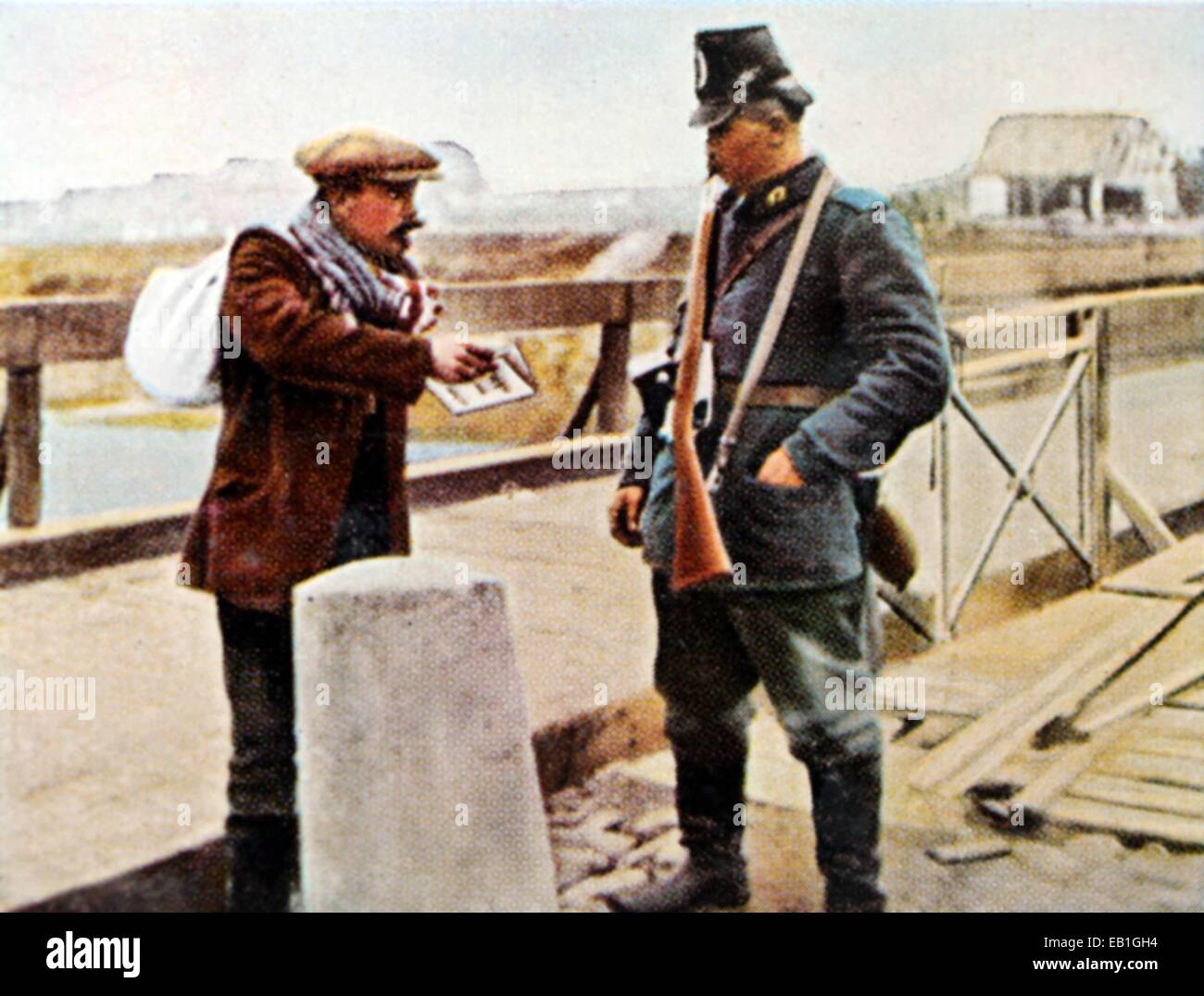 The contemporary colorized German propaganda photo shows a local being ...