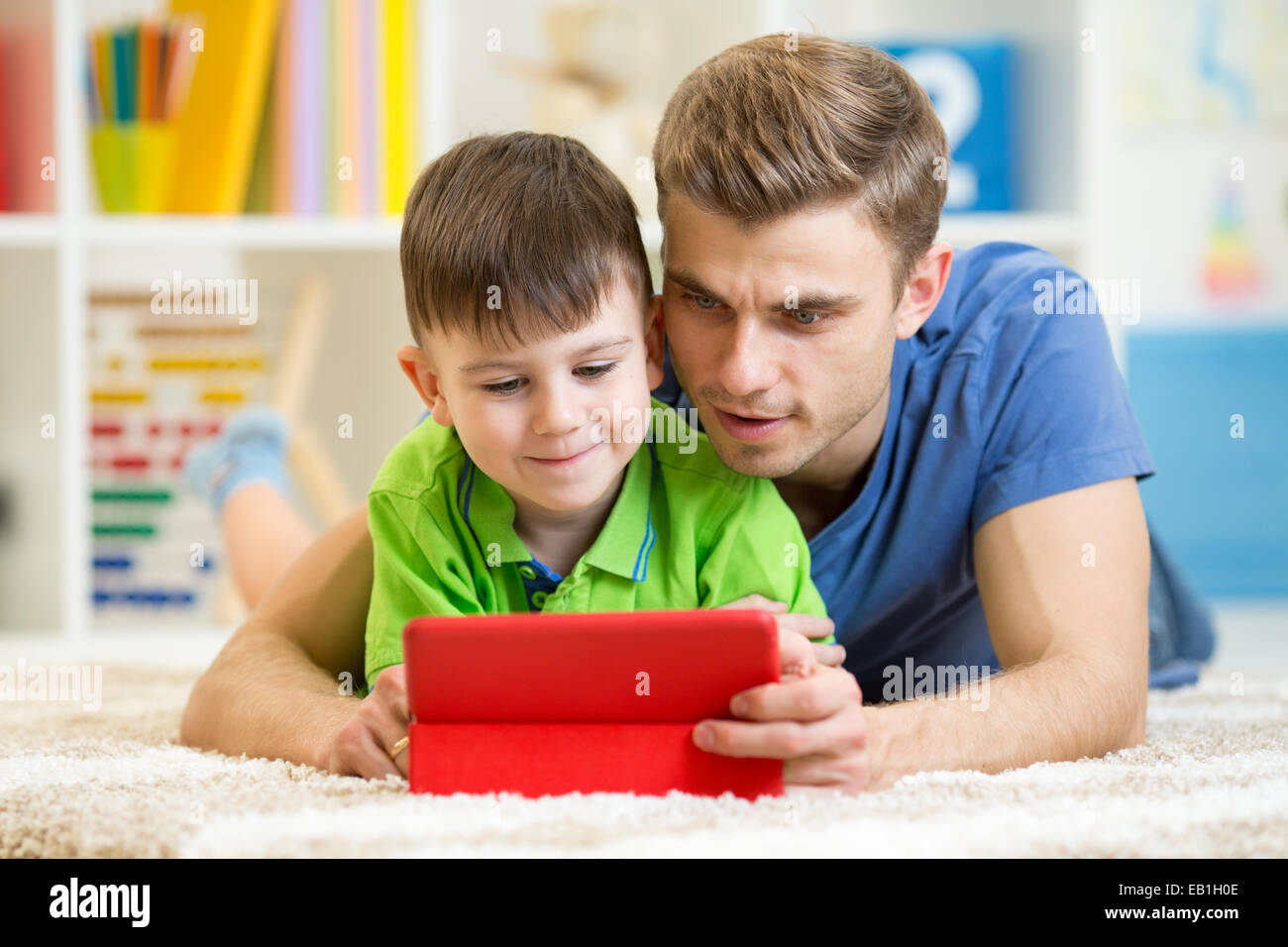 Family with tablet device hi-res stock photography and images - Alamy