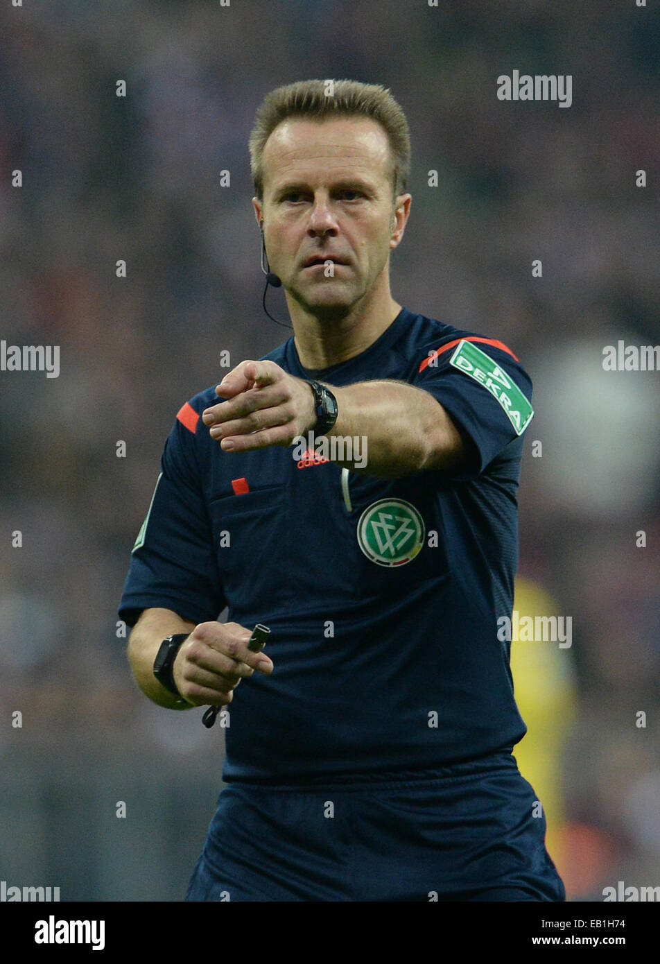 Munich, Germany. 22nd Nov, 2014. Referee Peter Gagelmann reacts during ...