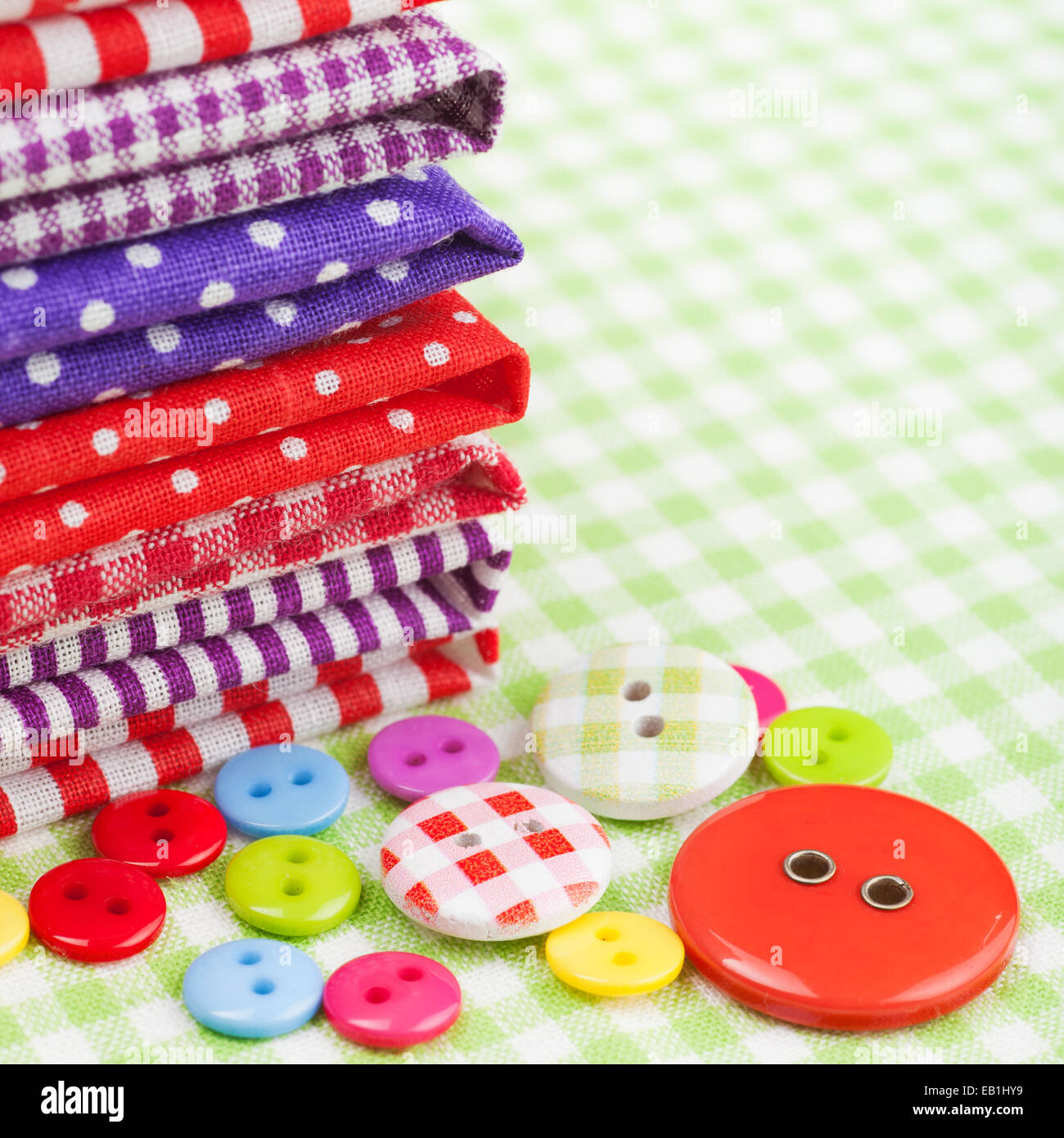 Sewing items: buttons and colorful fabrics Stock Photo - Alamy