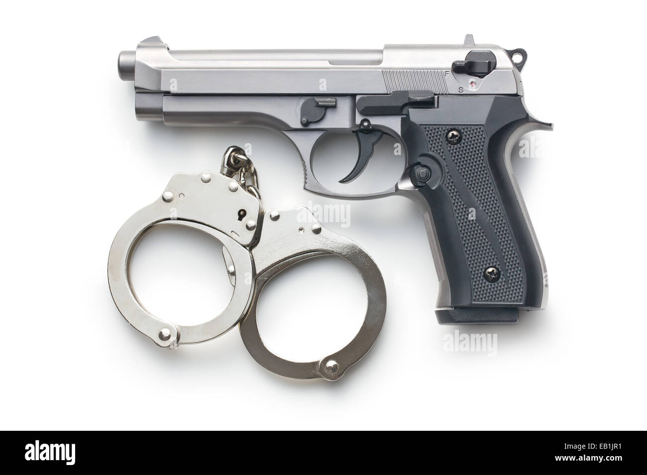 gun and handcuffs on white background Stock Photo - Alamy