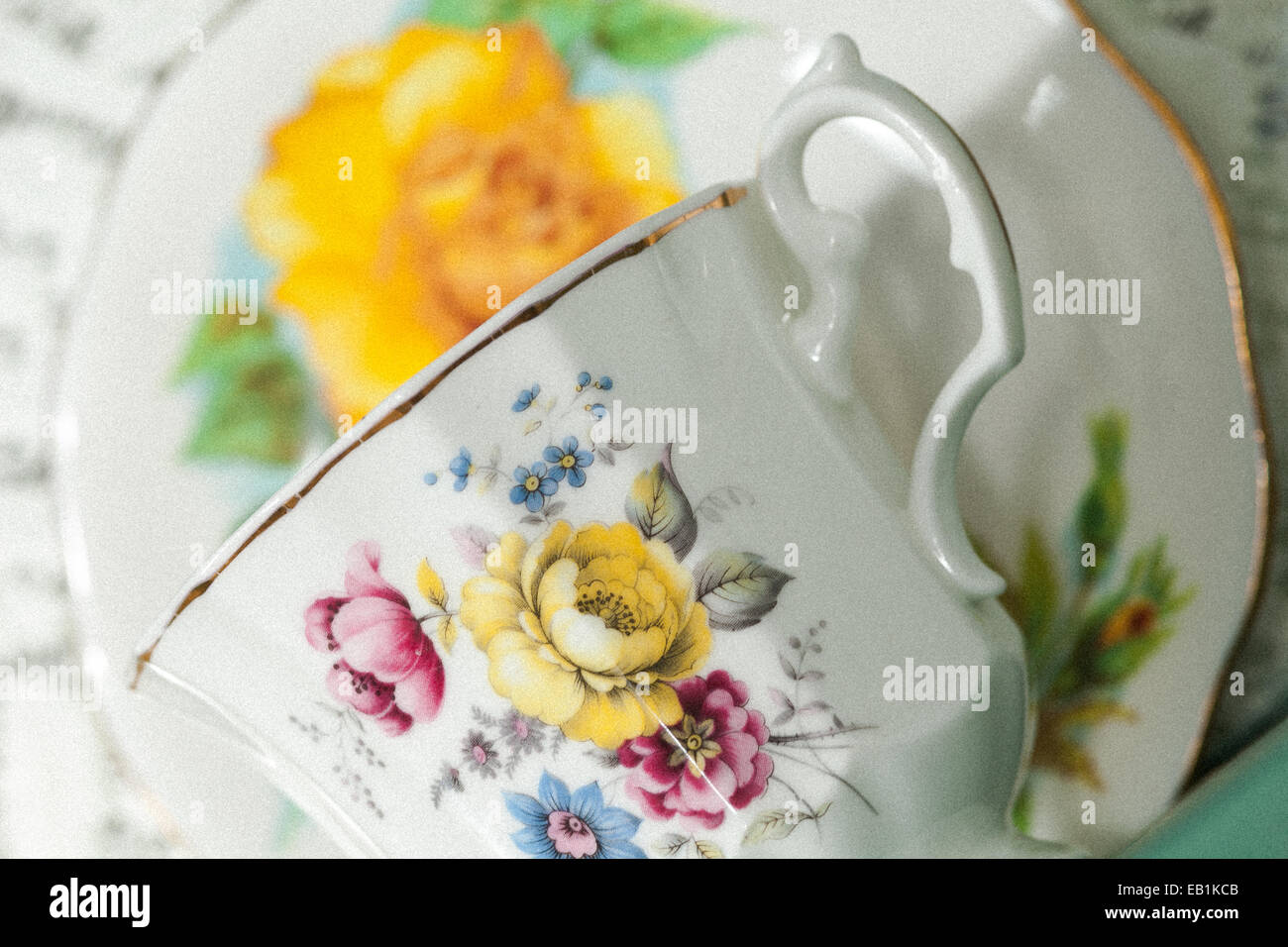 Vintage teacup with bright flowers Stock Photo - Alamy