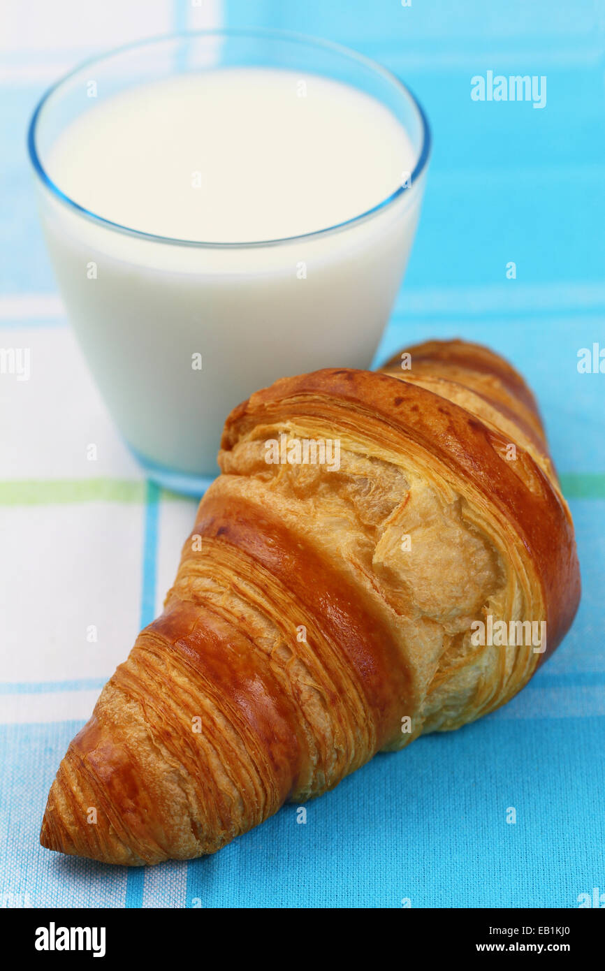 Butter croissant with glass of milk, closeup Stock Photo - Alamy