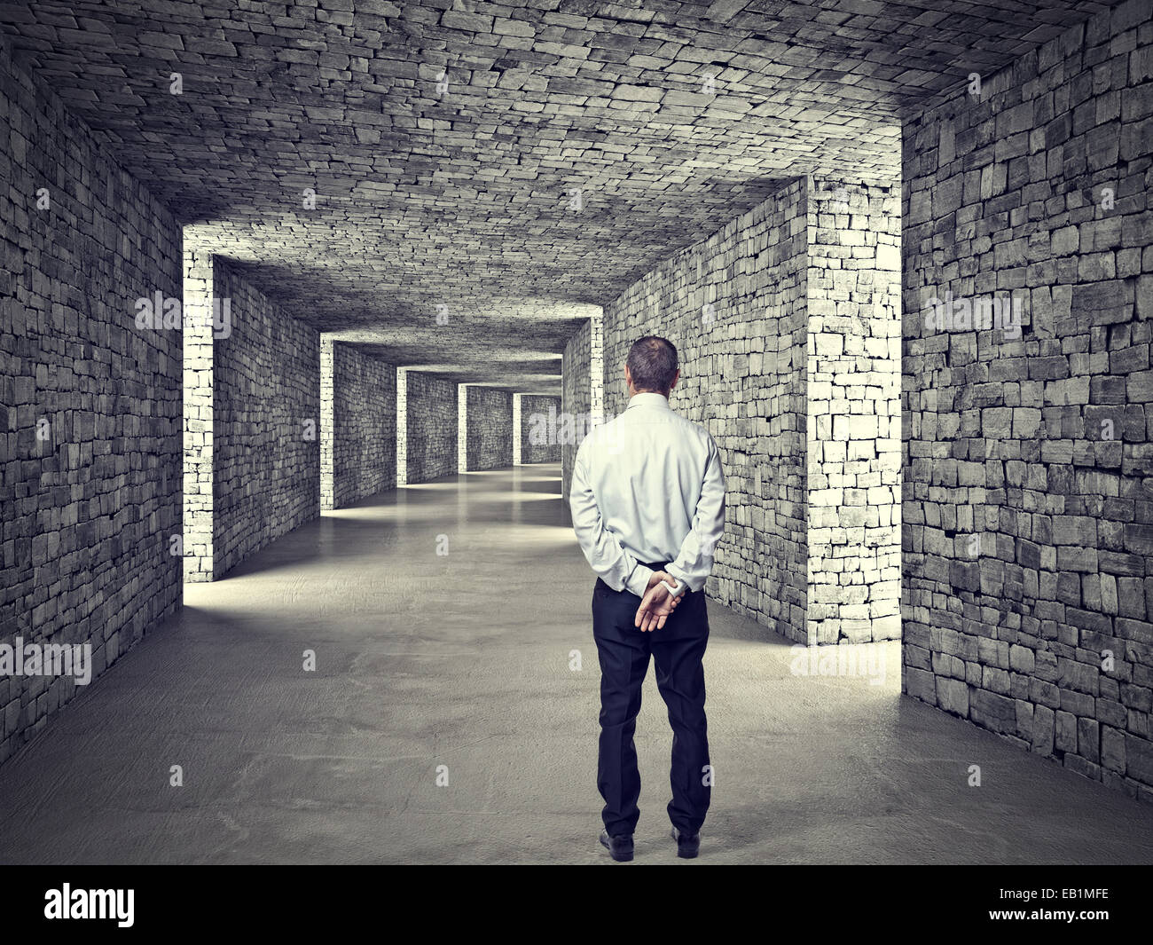 standing man and 3d stone tunnel Stock Photo - Alamy