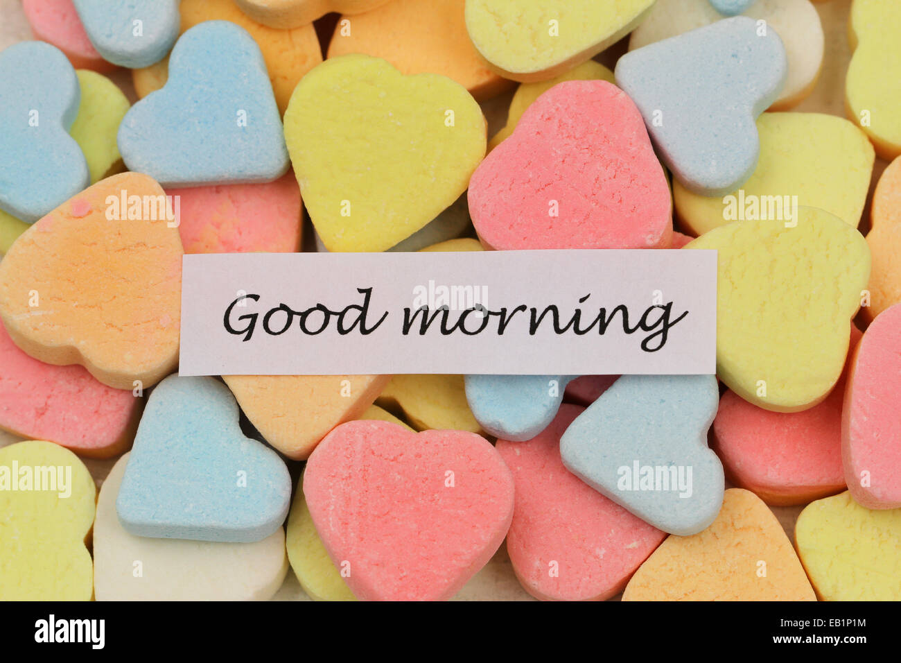 Good morning card with colorful sugar hearts Stock Photo - Alamy