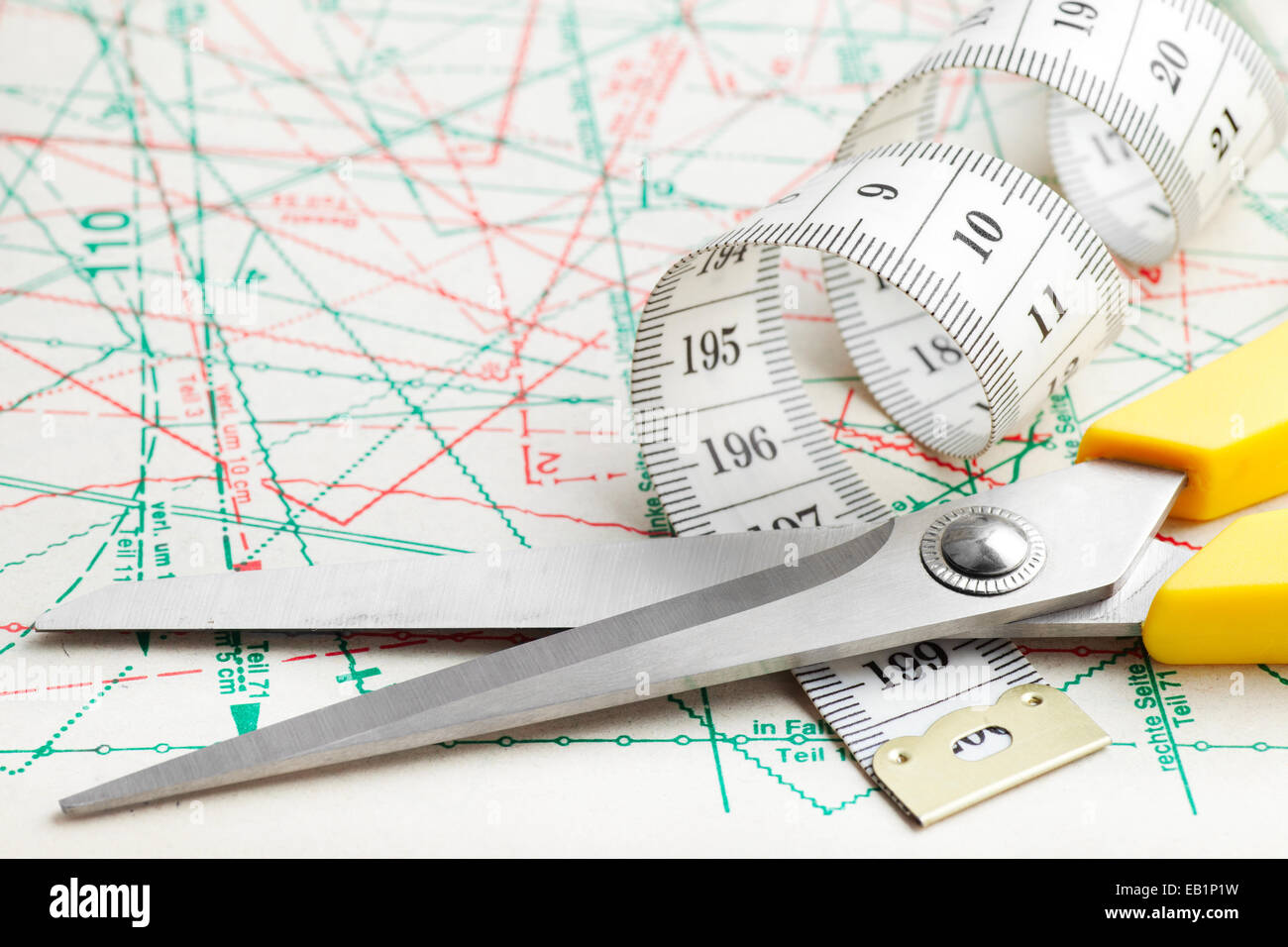 scissors and measuring tape on sewing pattern Stock Photo - Alamy