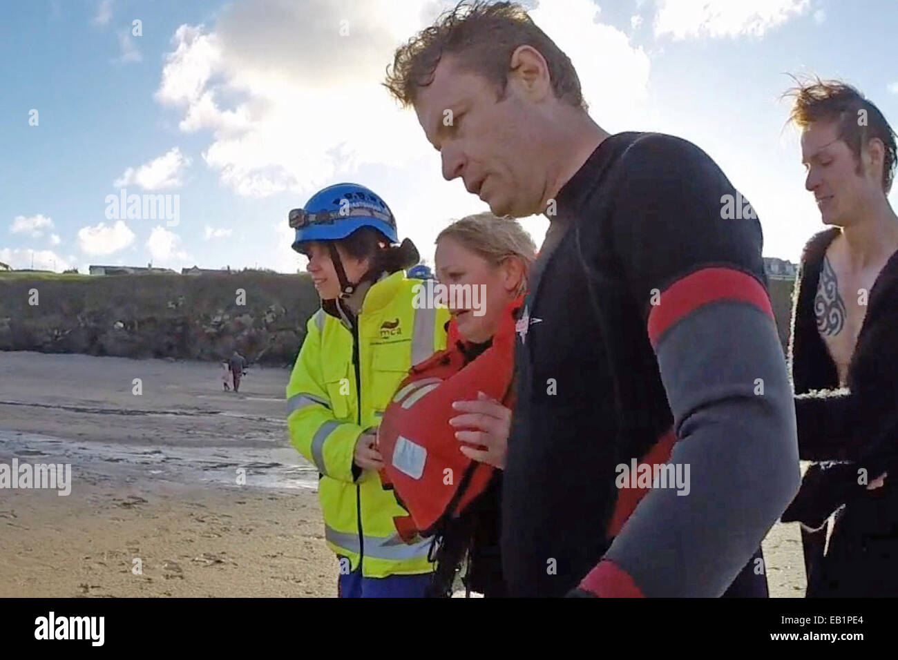 Porth Beach, Cornwall, UK. 23rd Nov, 2014. A new bride was saved by ...