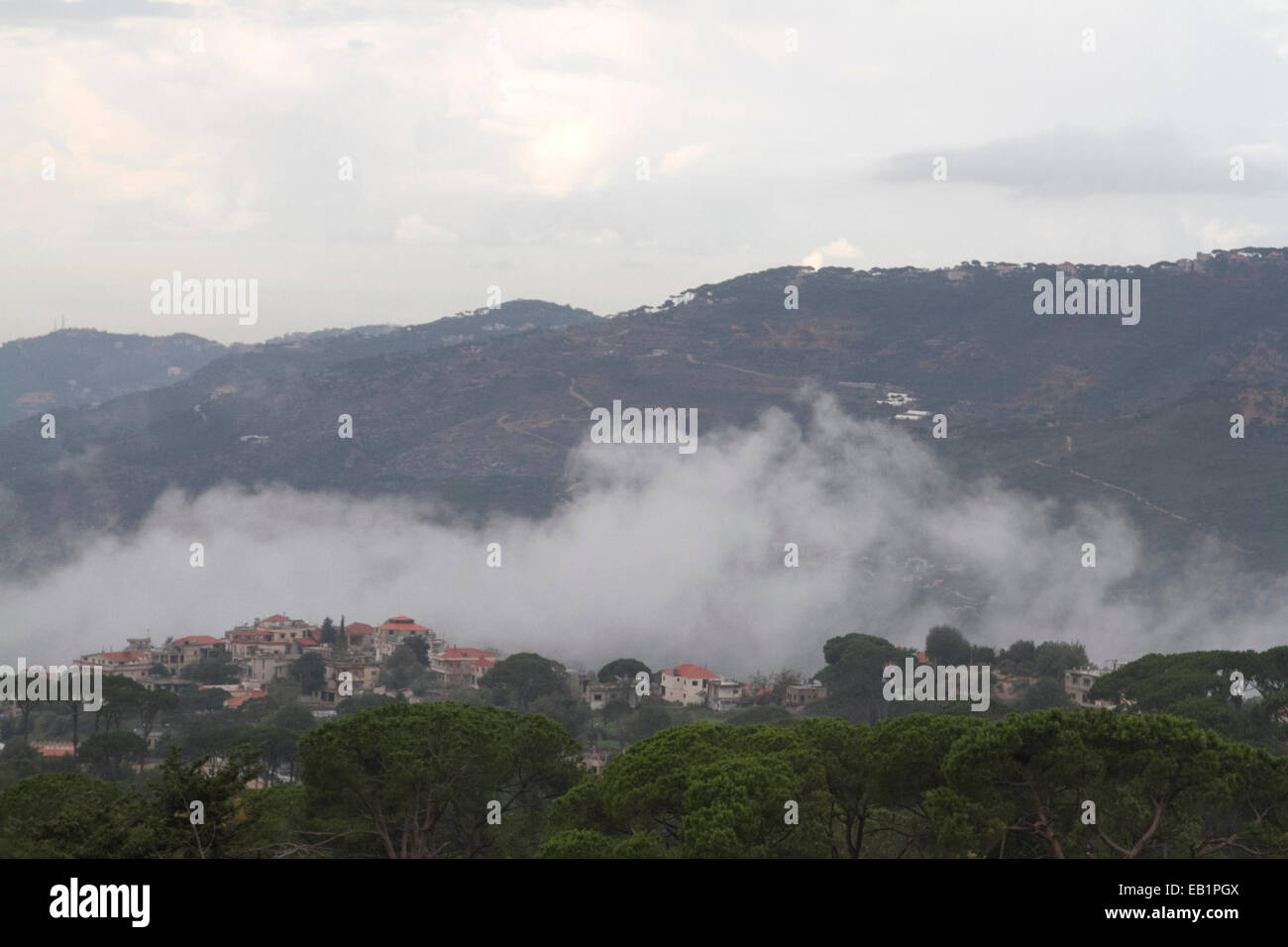 Beirut, Lebanon. 24th November, 2014. Cold mist covers the hills above ...