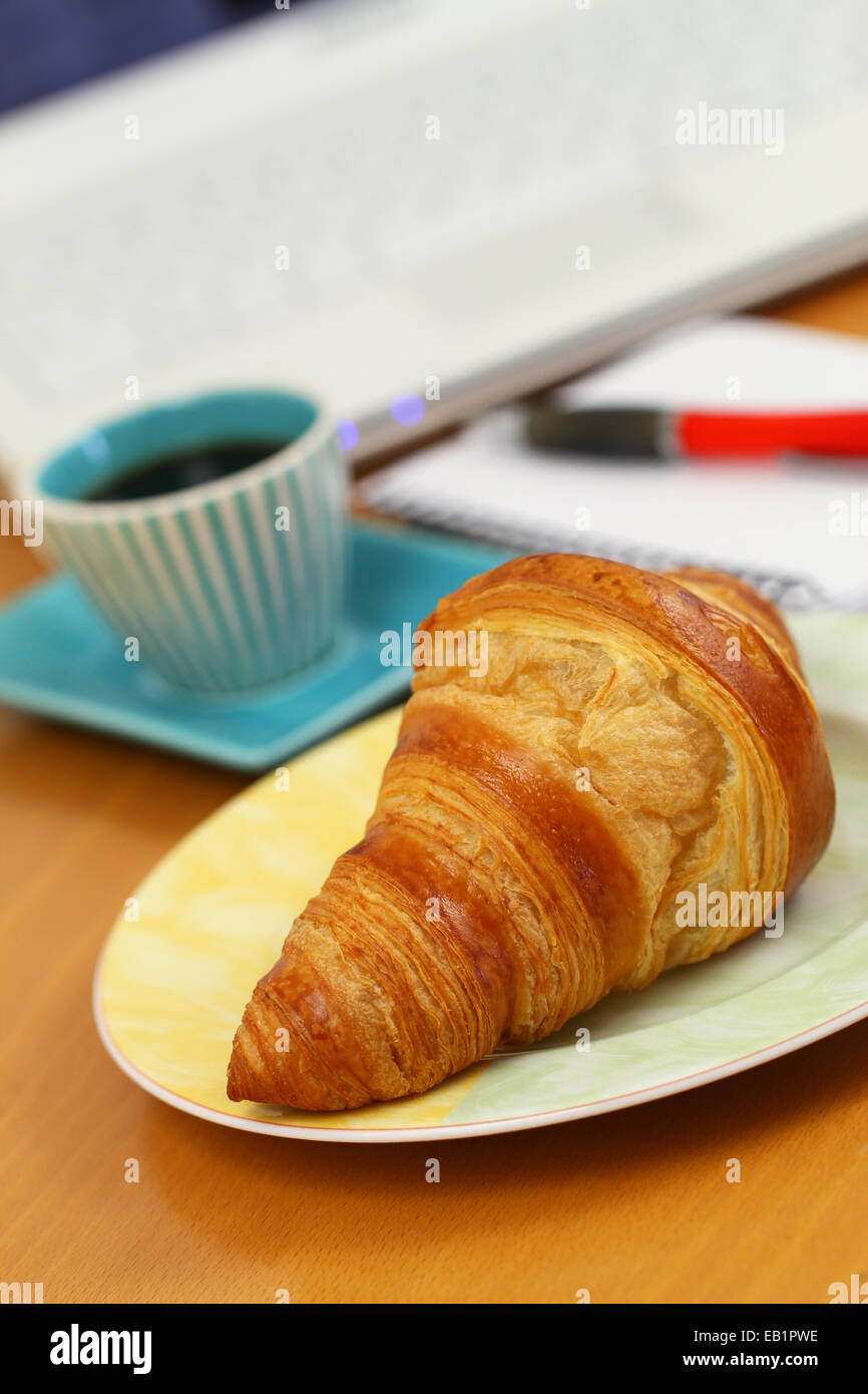 Laptop coffee croissant notebook hi-res stock photography and images ...