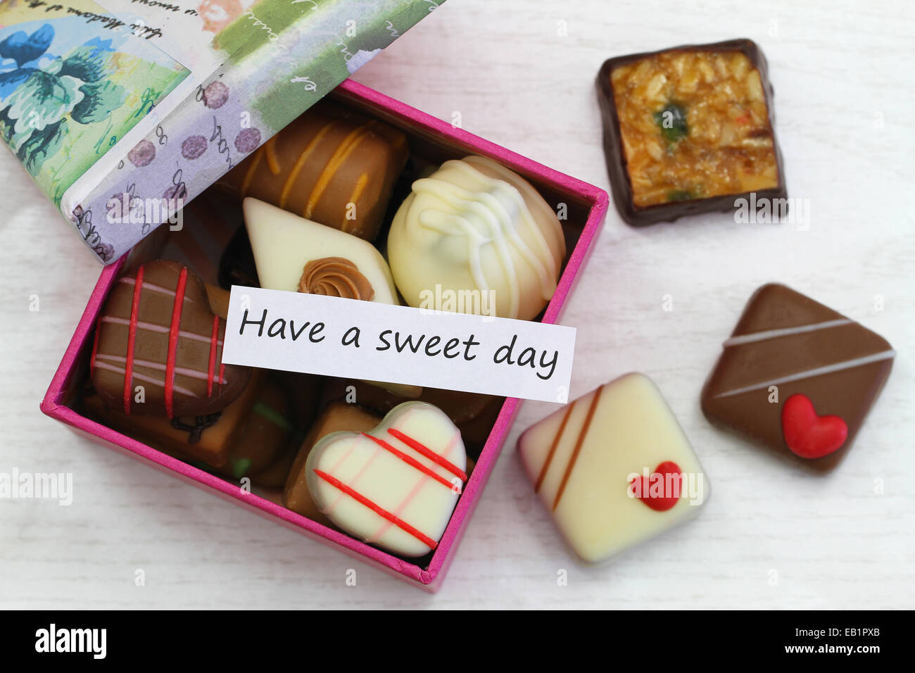 Have a sweet day card with box of chocolates Stock Photo - Alamy