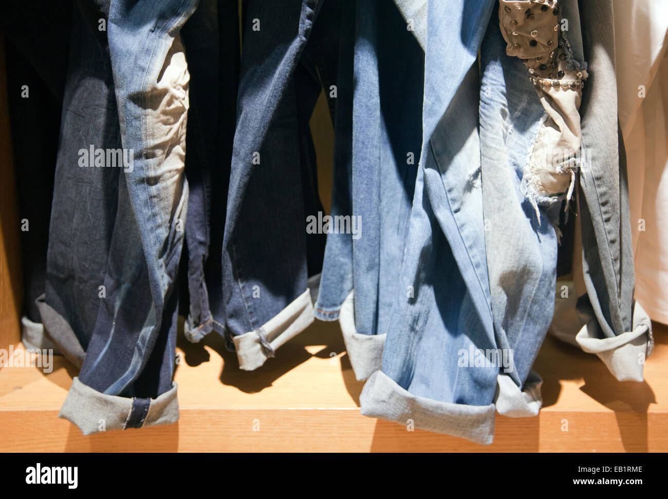 Men's Jeans Retail Display - Trouser Legs Turned Up Stock Photo - Alamy