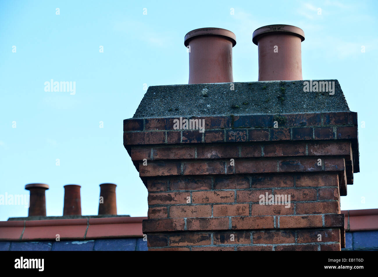 Traditional chimney pots hi-res stock photography and images - Alamy
