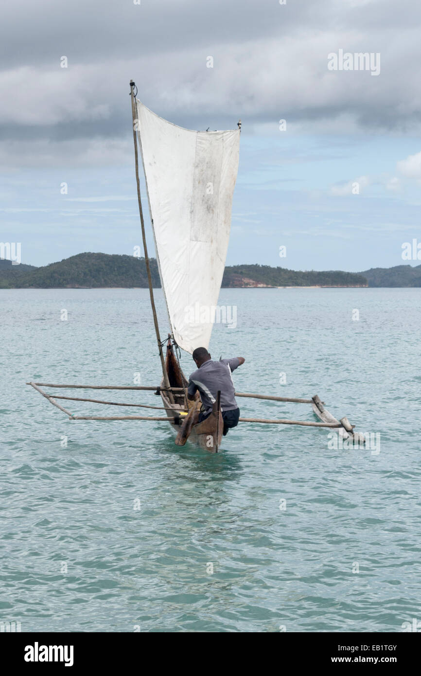 A man sailing a dug-out boat in Madagascar Stock Photo - Alamy