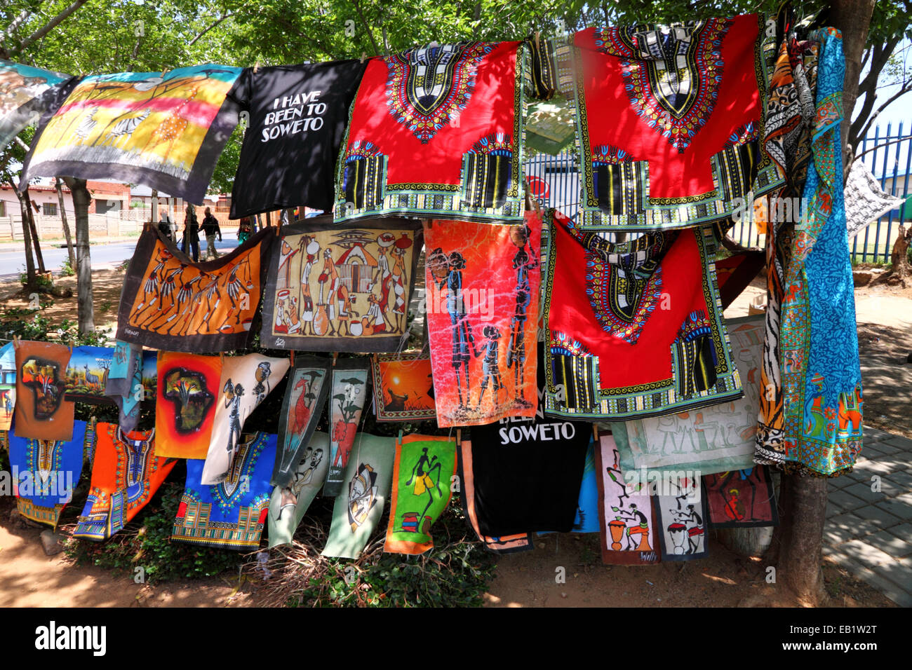 A market stall selling colourful African fabrics Stock Photo - Alamy
