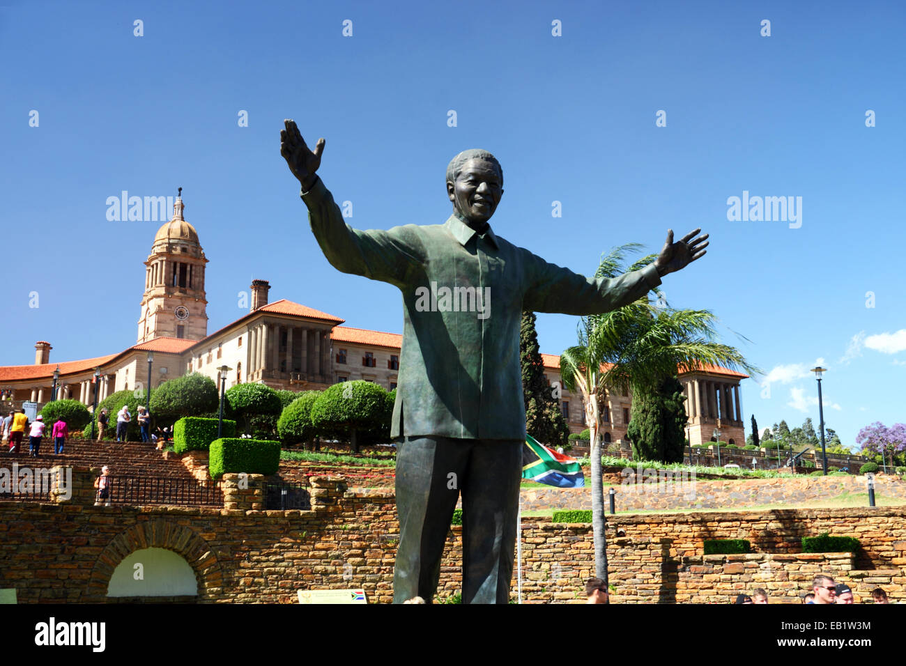 A statue of Nelson Mandela with his arms outstretched with the Union ...
