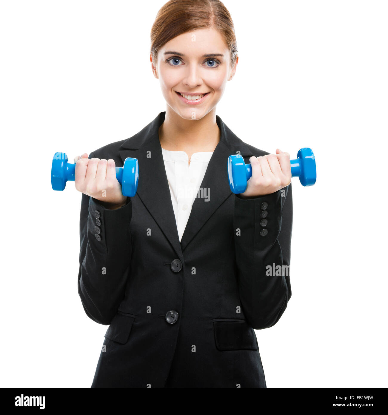Beautiful and young business woman lifting weights and smiling ...