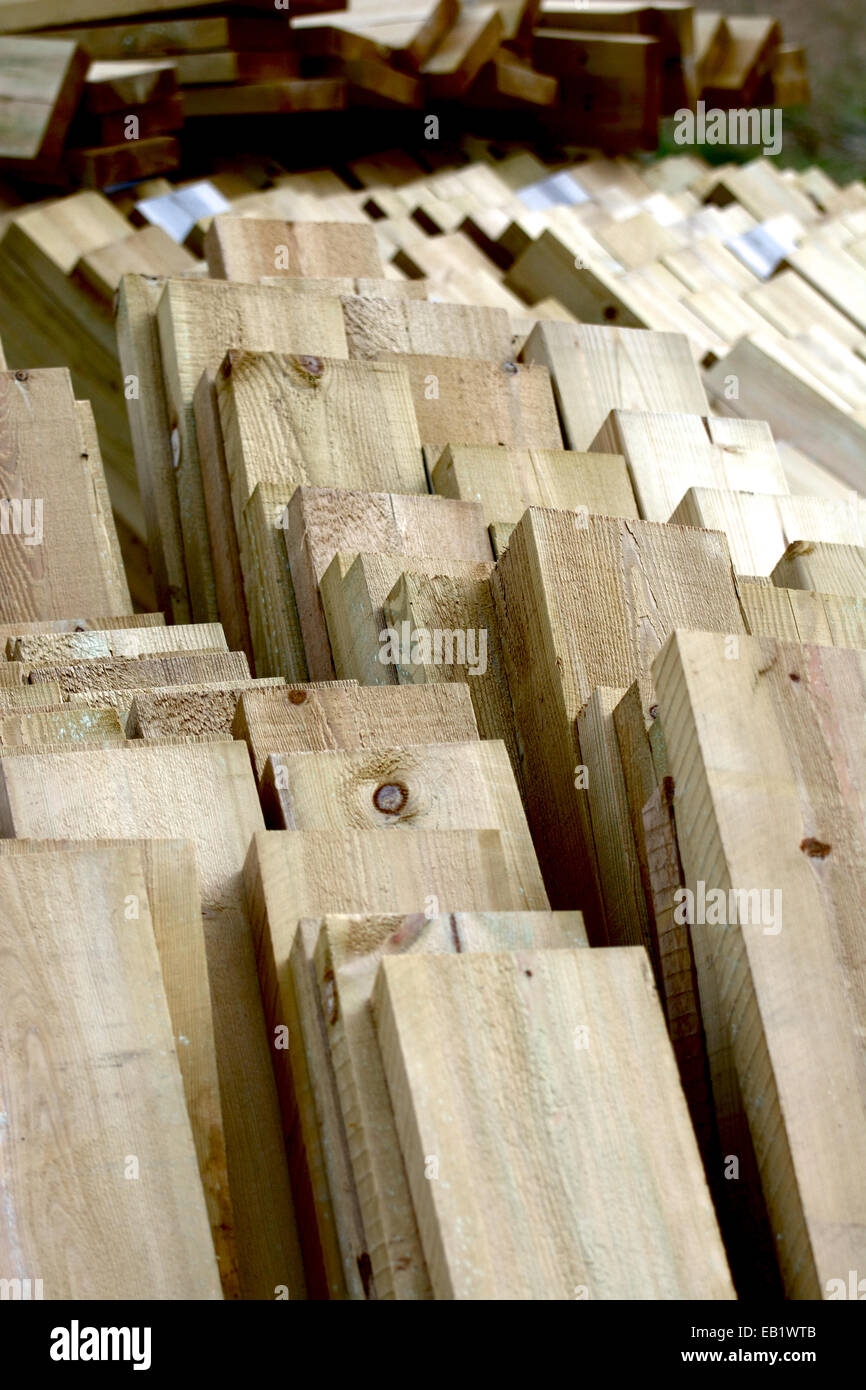 Lumber or timber stacked ready for use Stock Photo - Alamy